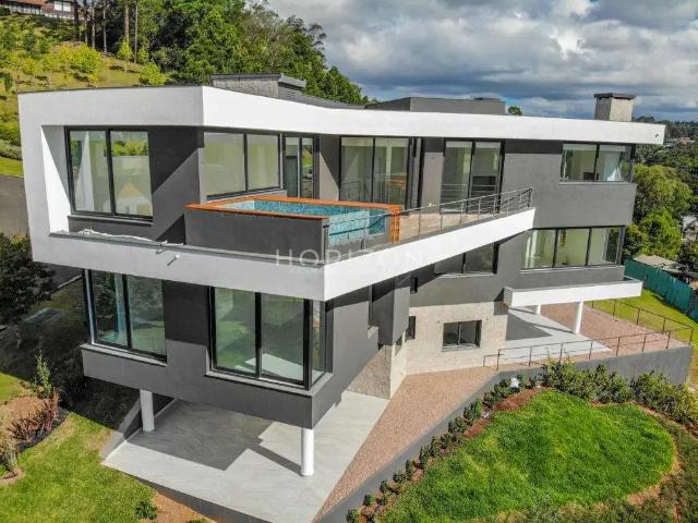 Casa / Sobrado para Venda em Gramado/RS Alphaville 4 Quartos