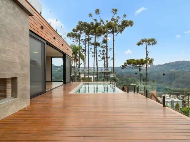 Casa / Sobrado para Venda em Gramado/RS Alphaville 4 Quartos