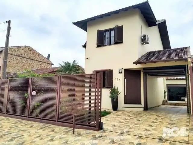 Casa / Sobrado para Venda em Guaíba/RS Nossa Sra. De Fátima 3 Quartos