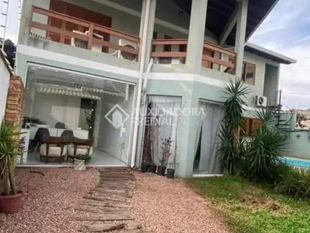 Casa / Sobrado para Venda em Guaíba/RS Parque 35 4 Quartos