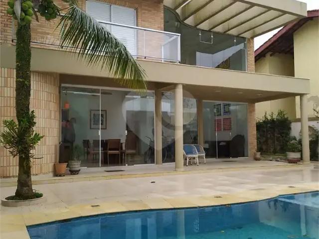 Casa / Sobrado para Venda em Guarujá/SP Enseada 4 Quartos