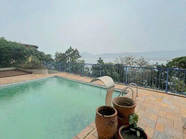 Casa / Sobrado para Venda em Guarujá/SP Jardim Três Marias 4 Quartos