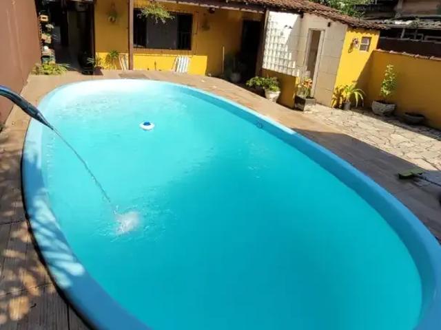 Casa / Sobrado para Venda em Guarujá/SP Vila Santo Antônio 4 Quartos