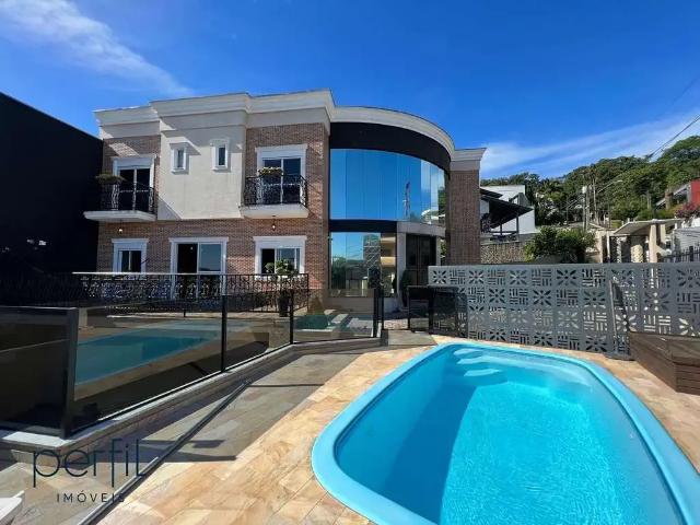 Casa / Sobrado para Venda em Joinville/SC Bom Retiro 4 Quartos