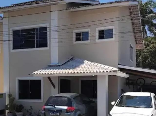 Casa / Sobrado para Venda em Lauro de Freitas/BA Buraquinho 4 Quartos