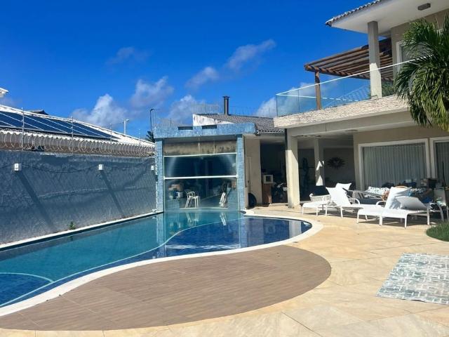 Casa / Sobrado para Venda em Lauro de Freitas/BA Buraquinho 5 Quartos