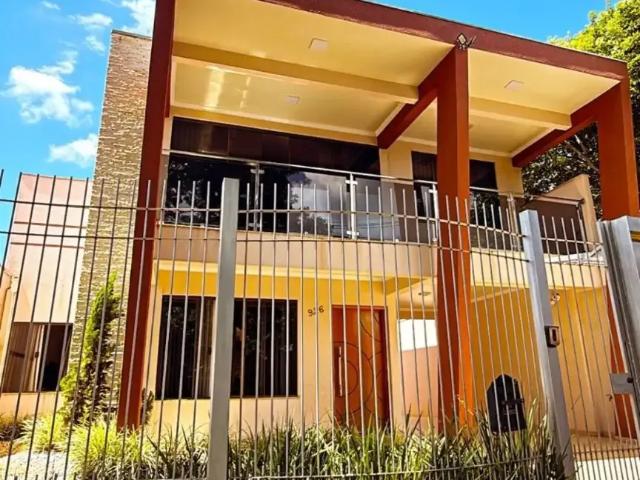 Casa / Sobrado para Venda em Marialva/PR Centro 4 Quartos