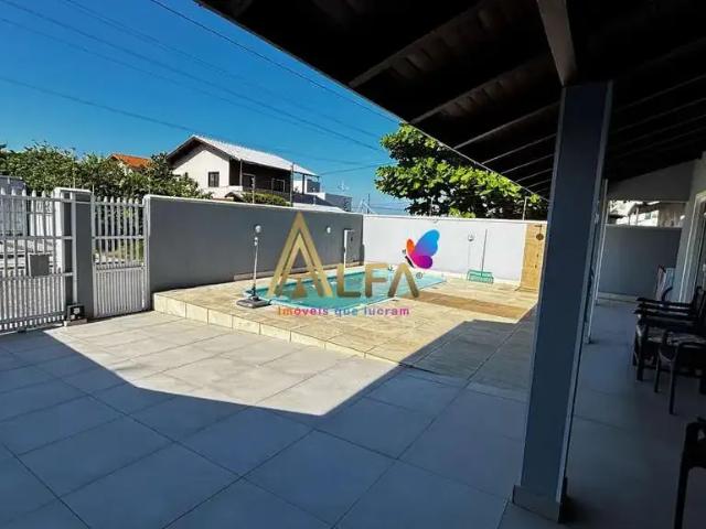 Casa / Sobrado para Venda em Navegantes/SC Meia Praia 4 Quartos