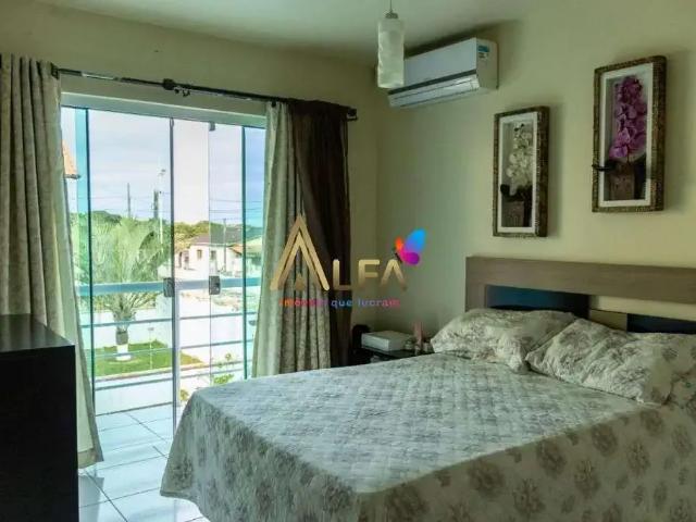 Casa / Sobrado para Venda em Navegantes/SC Meia Praia 4 Quartos