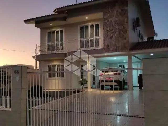 Casa / Sobrado para Venda em Palhoça/SC Aririu 3 Quartos