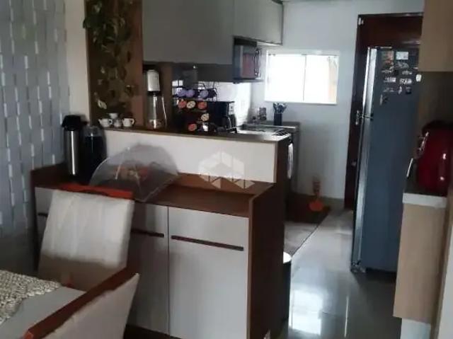 Casa / Sobrado para Venda em Palhoça/SC Aririu 3 Quartos