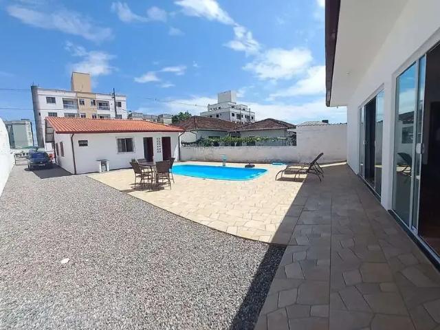 Casa / Sobrado para Venda em Palhoça/SC Barra do Aririú 3 Quartos