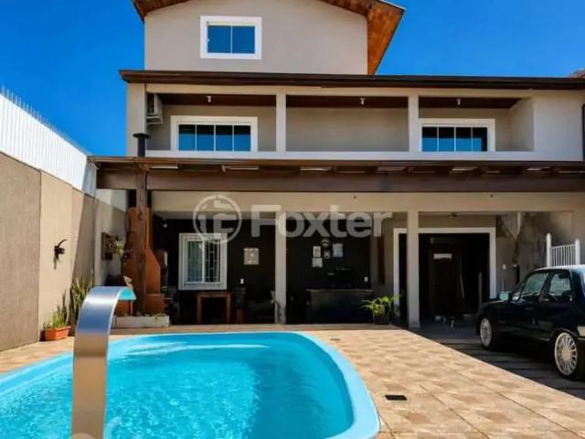 Casa / Sobrado para Venda em Palhoça/SC Enseada de Brito 3 Quartos