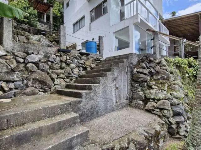 Casa / Sobrado para Venda em Palhoça/SC Enseada de Brito 3 Quartos