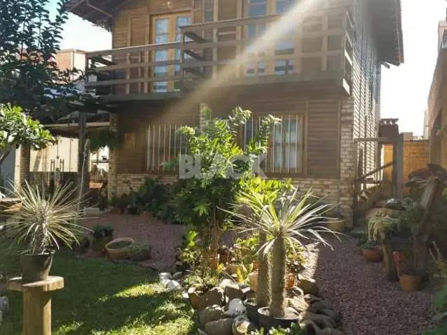 Casa / Sobrado para Venda em Passo de Torres/SC Centro 3 Quartos