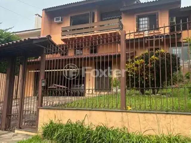Casa / Sobrado para Venda em Porto Alegre/RS Três Figueiras 4 Quartos