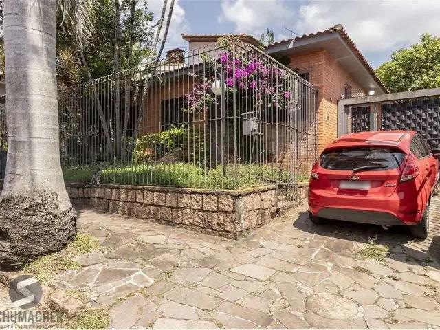 Casa / Sobrado para Venda em Porto Alegre/RS Três Figueiras 4 Quartos