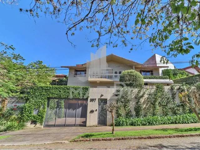 Casa / Sobrado para Venda em Porto Alegre/RS Três Figueiras 4 Quartos