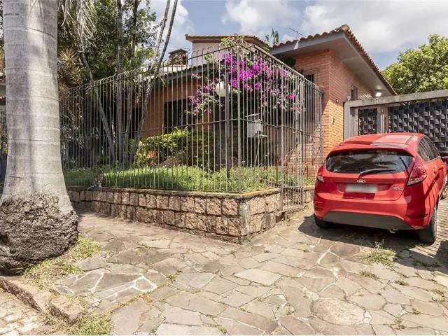 Casa / Sobrado para Venda em Porto Alegre/RS Três Figueiras 4 Quartos