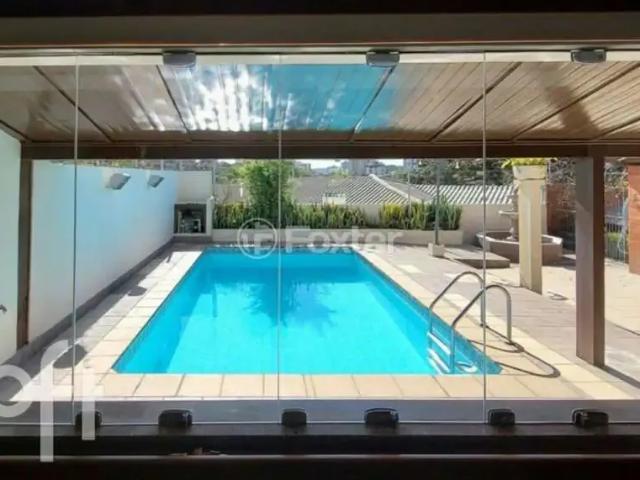 Casa / Sobrado para Venda em Porto Alegre/RS Três Figueiras 4 Quartos