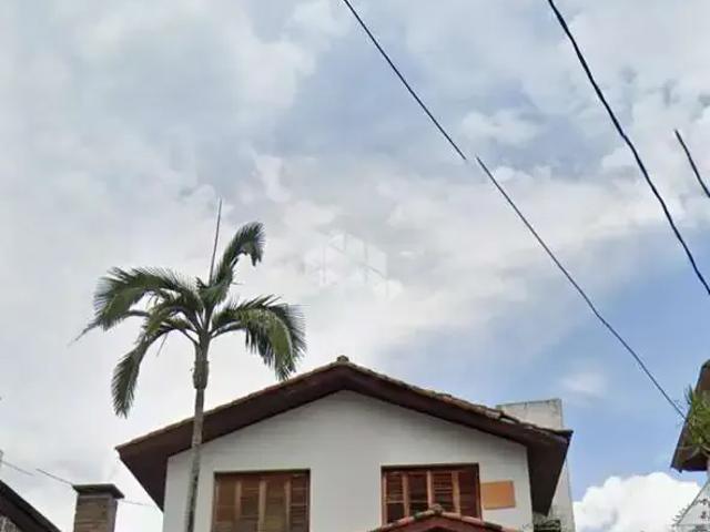 Casa / Sobrado para Venda em Porto Alegre/RS Três Figueiras 4 Quartos
