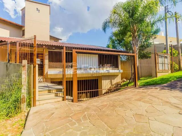 Casa / Sobrado para Venda em Porto Alegre/RS Três Figueiras 4 Quartos
