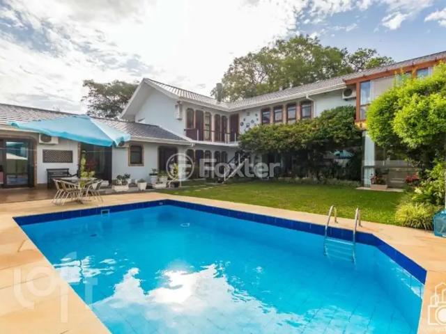 Casa / Sobrado para Venda em Porto Alegre/RS Três Figueiras 4 Quartos