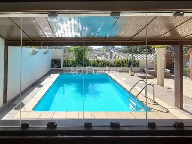 Casa / Sobrado para Venda em Porto Alegre/RS Três Figueiras 4 Quartos