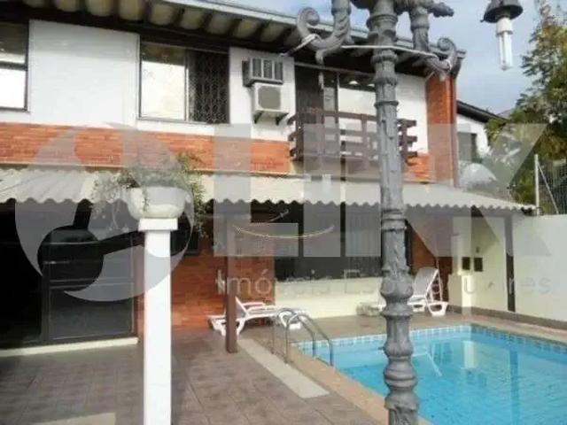 Casa / Sobrado para Venda em Porto Alegre/RS Três Figueiras 4 Quartos