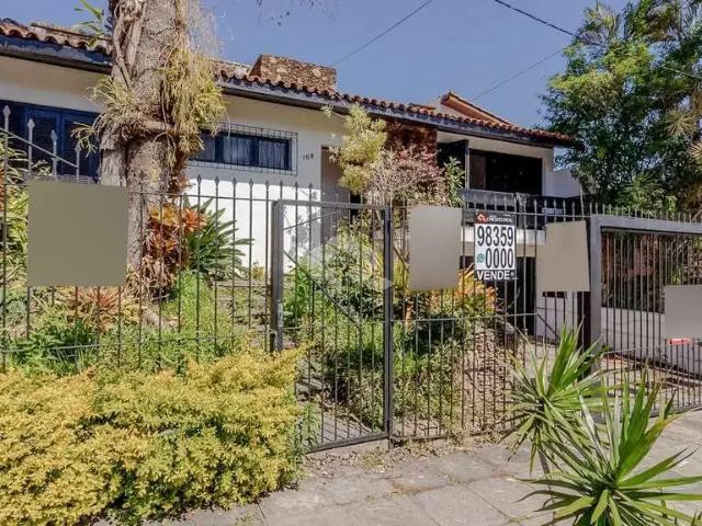 Casa / Sobrado para Venda em Porto Alegre/RS Três Figueiras 4 Quartos