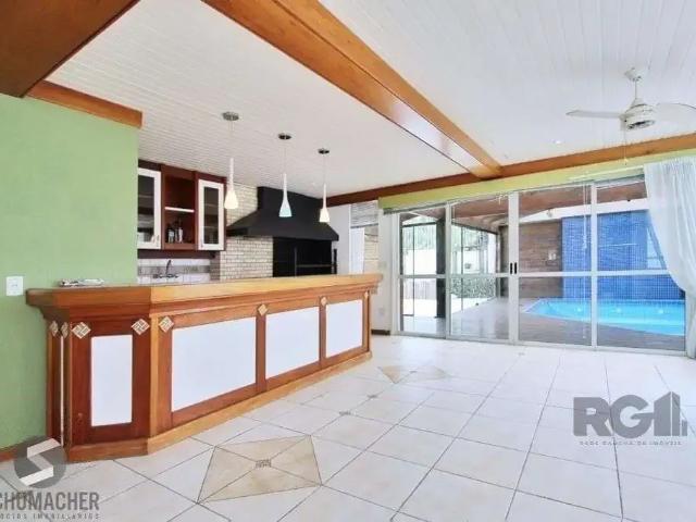 Casa / Sobrado para Venda em Porto Alegre/RS Três Figueiras 4 Quartos