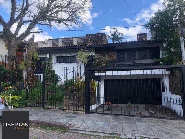Casa / Sobrado para Venda em Porto Alegre/RS Três Figueiras 4 Quartos