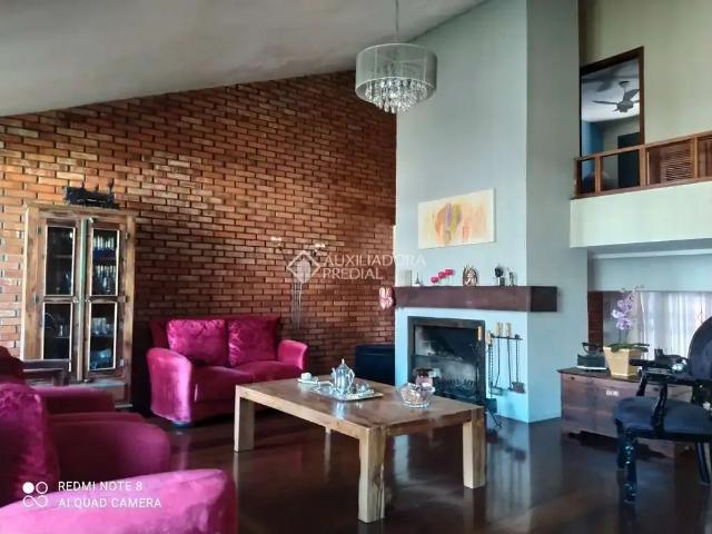 Casa / Sobrado para Venda em Porto Alegre/RS Três Figueiras 4 Quartos