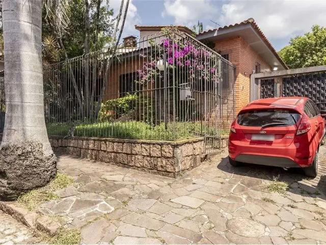Casa / Sobrado para Venda em Porto Alegre/RS Três Figueiras 4 Quartos