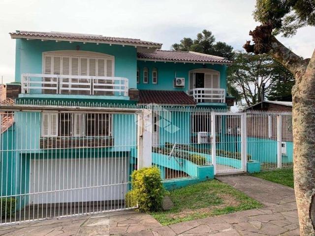 Casa / Sobrado para Venda em Porto Alegre/RS Três Figueiras 4 Quartos