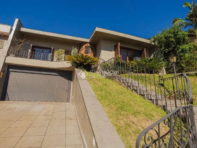 Casa / Sobrado para Venda em Porto Alegre/RS Três Figueiras 4 Quartos