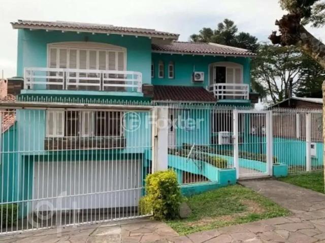 Casa / Sobrado para Venda em Porto Alegre/RS Três Figueiras 4 Quartos