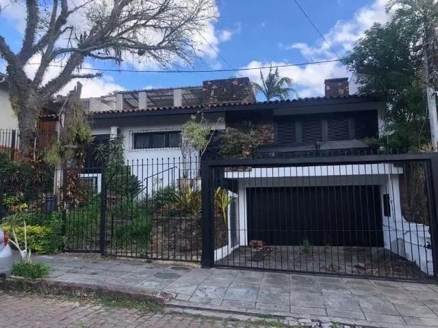 Casa / Sobrado para Venda em Porto Alegre/RS Três Figueiras 4 Quartos