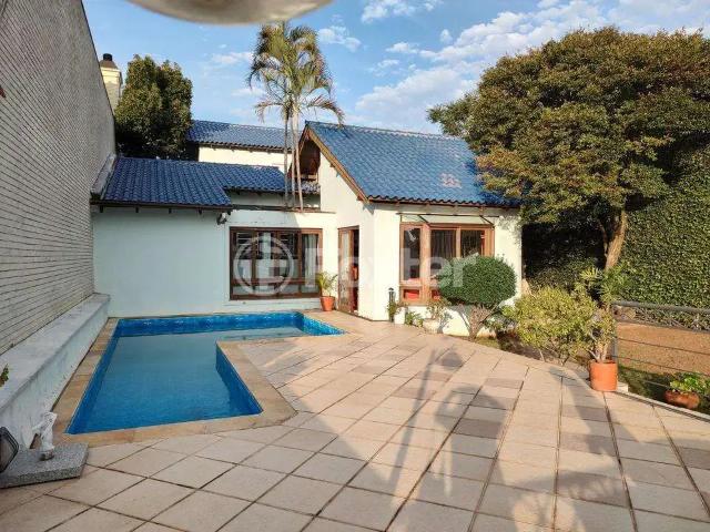 Casa / Sobrado para Venda em Porto Alegre/RS Três Figueiras 5 Quartos