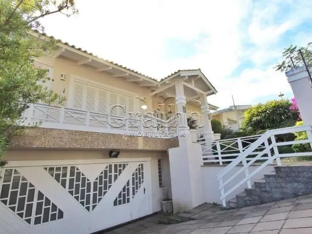 Casa / Sobrado para Venda em Porto Alegre/RS Três Figueiras 5 Quartos