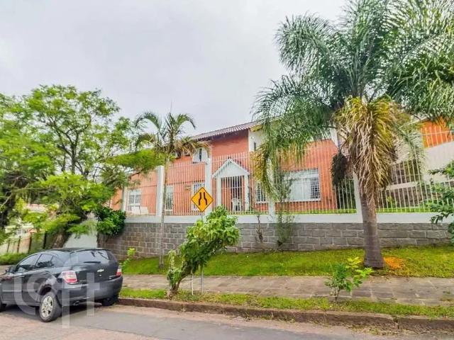 Casa / Sobrado para Venda em Porto Alegre/RS Três Figueiras 5 Quartos