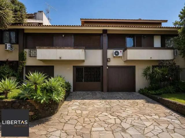 Casa / Sobrado para Venda em Porto Alegre/RS Três Figueiras 3 Quartos