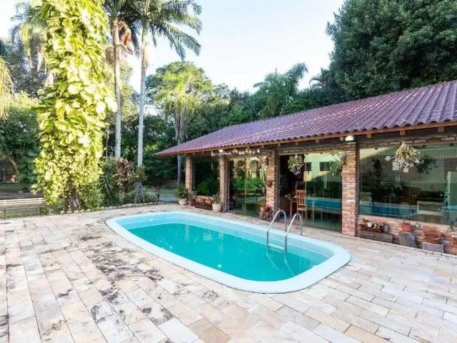 Casa / Sobrado para Venda em Porto Alegre/RS Tristeza 4 Quartos