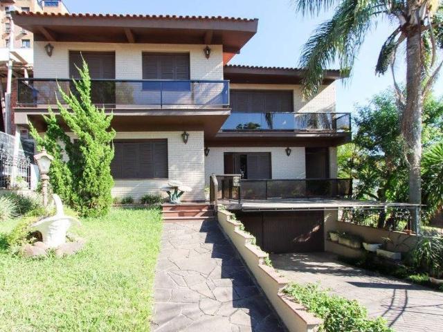 Casa / Sobrado para Venda em Porto Alegre/RS Tristeza 4 Quartos