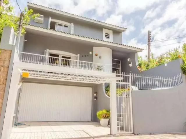 Casa / Sobrado para Venda em Porto Alegre/RS Tristeza 3 Quartos