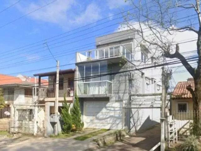Casa / Sobrado para Venda em Porto Alegre/RS Vila Nova 3 Quartos