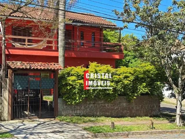 Casa / Sobrado para Venda em Porto Alegre/RS Vila Nova 3 Quartos