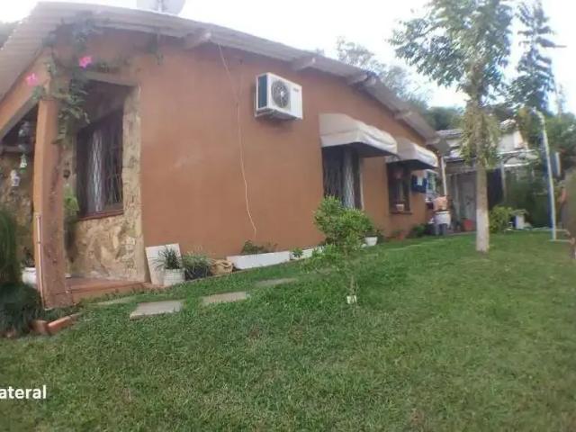 Casa / Sobrado para Venda em Porto Alegre/RS Vila Nova 3 Quartos
