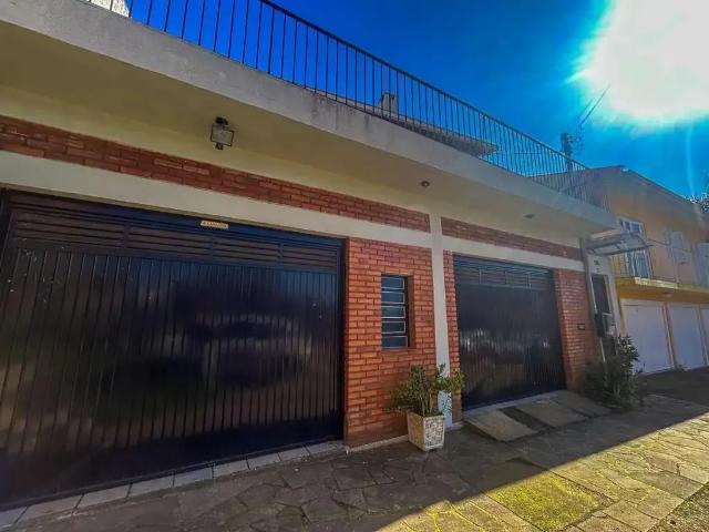 Casa / Sobrado para Venda em Porto Alegre/RS Vila Nova 3 Quartos