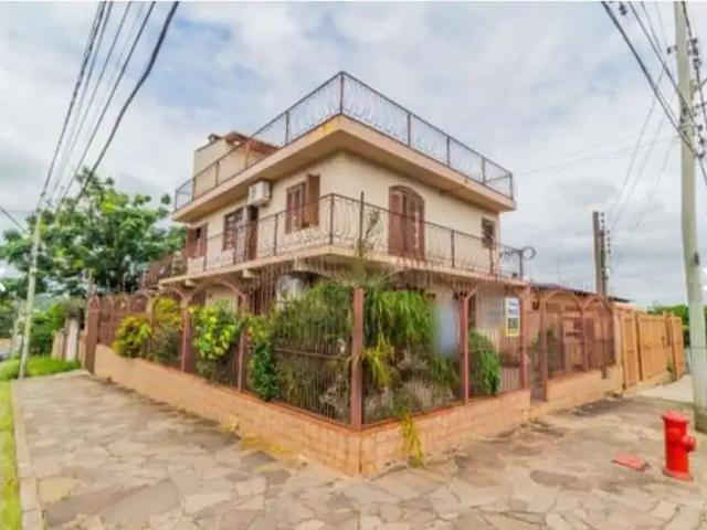 Casa / Sobrado para Venda em Porto Alegre/RS Vila Nova 3 Quartos